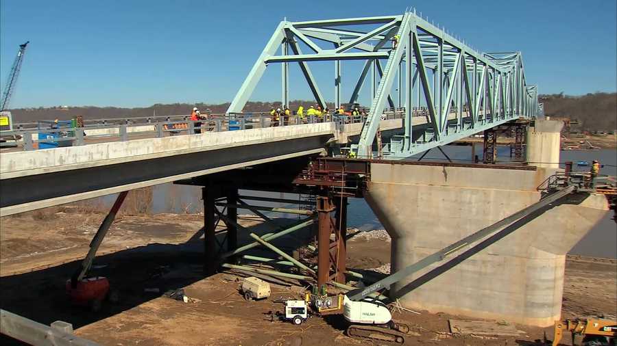 Concrete section of Milton-Madison Bridge slides into place