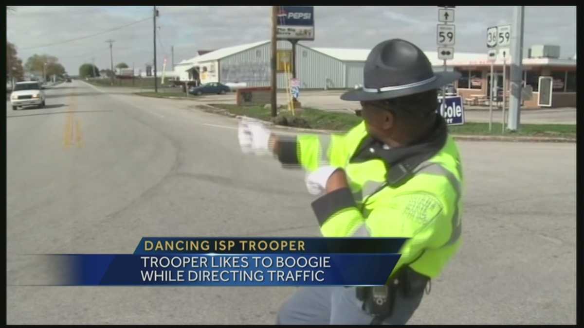 Dancing trooper has fun while directing traffic