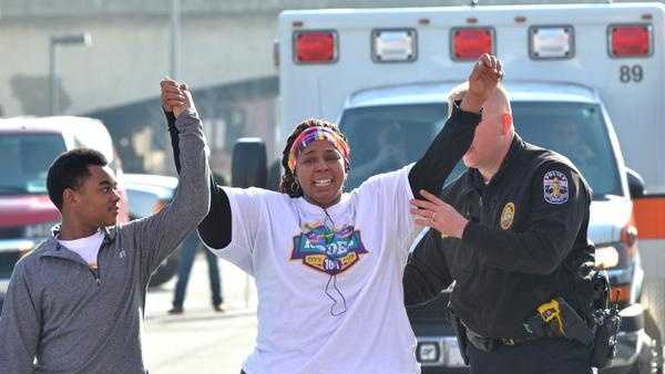 'Angel' police officer helps Louisville woman cross 10K finish line