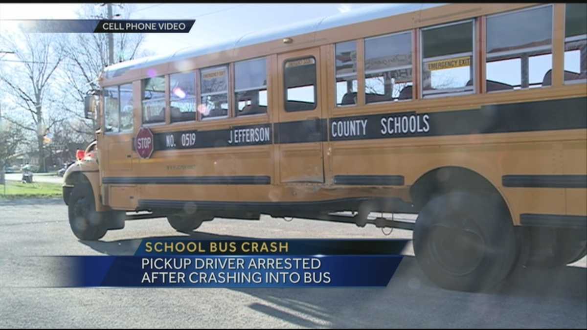 Man arrested after students, driver injured in school bus crash