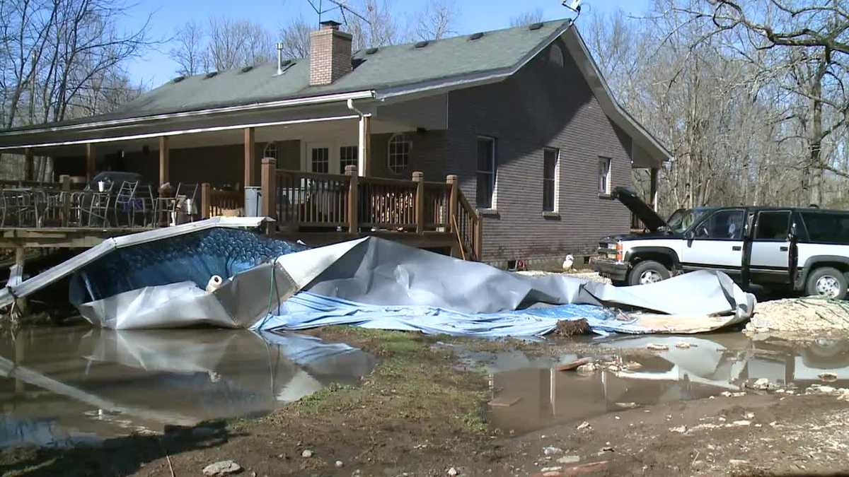 Family rescued after flooding traps them inside home