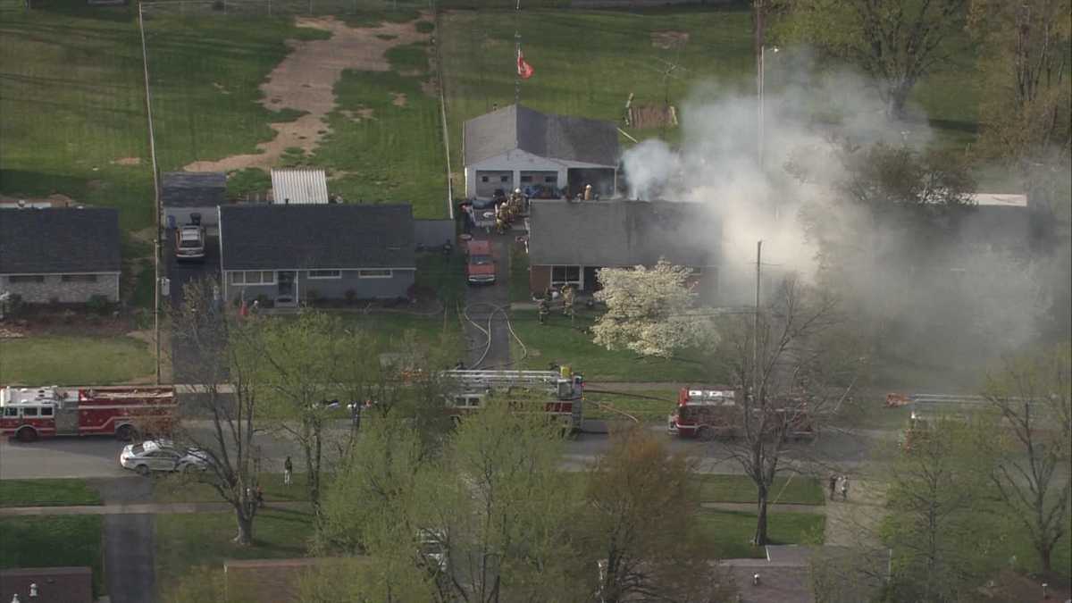 IMAGES: Fire crews respond to house fire on Kendall Lane