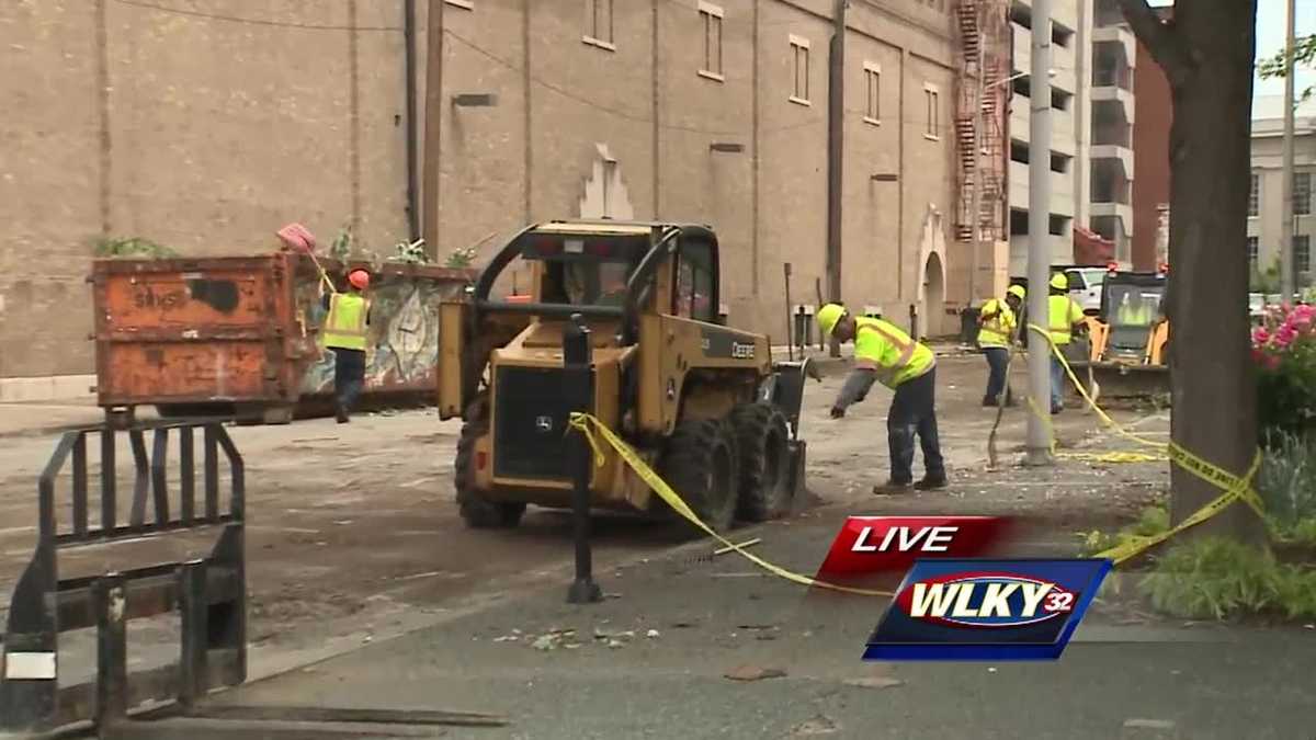 Crews clean up after wind blows roof off of Louisville Gardens