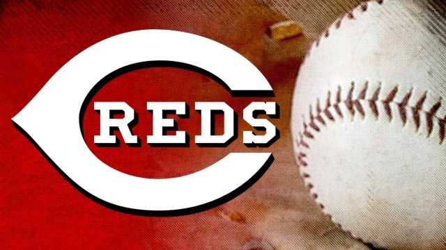 Phillips hits grand slam, drives in 6 to lead Reds