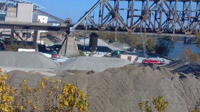 Images: Crews battle fire on railroad bridge over Ohio River