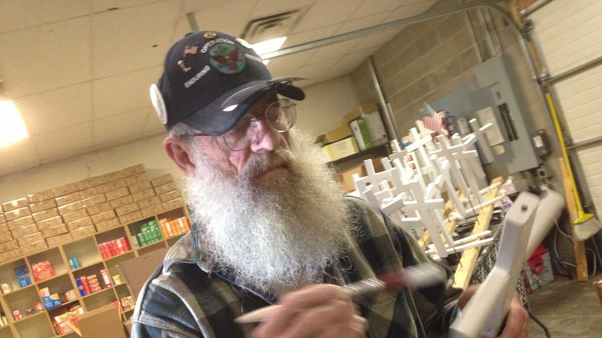 Images: Keith Maupin works inside the Yellow Ribbon Support Center