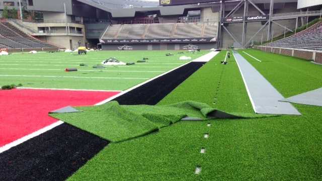 Photos: UC installs new turf