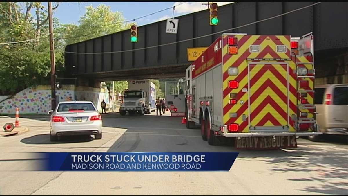 Bridge measured after dozens of trucks get stuck under CSX bridge