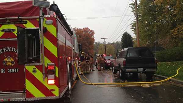 Images: 2 rescued from Lawrenceburg house fire