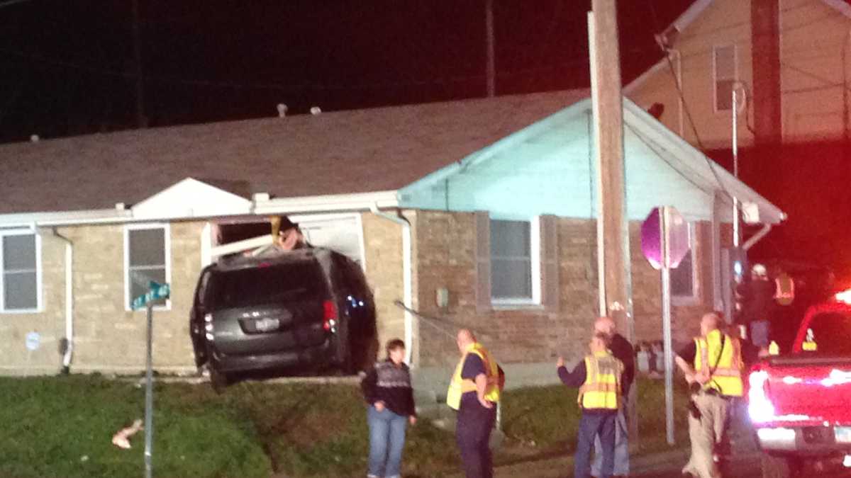 Scene photos: Van hits Waynesville home