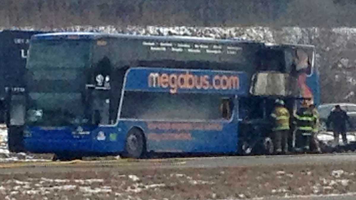 Photos: Megabus catches fire on I-74