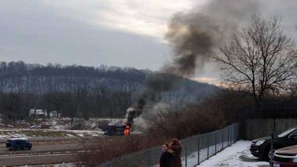 Photos: Megabus catches fire on I-74