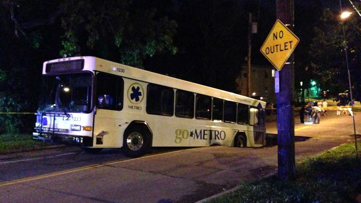 Photos: Metro bus falls into sinkhole