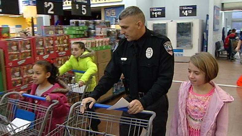 Kids, officers team up for 'Shop with Cop' program