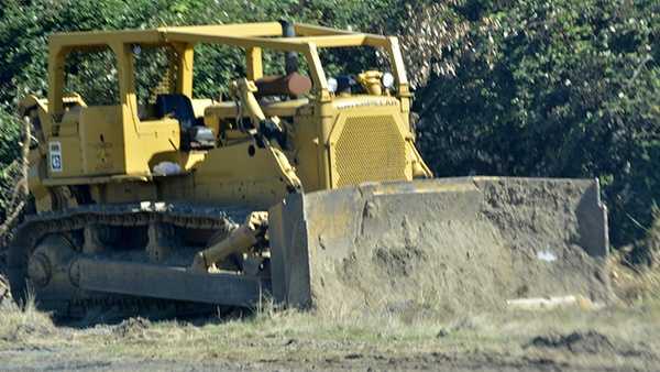 Man secretly bulldozes home while wife out running errands