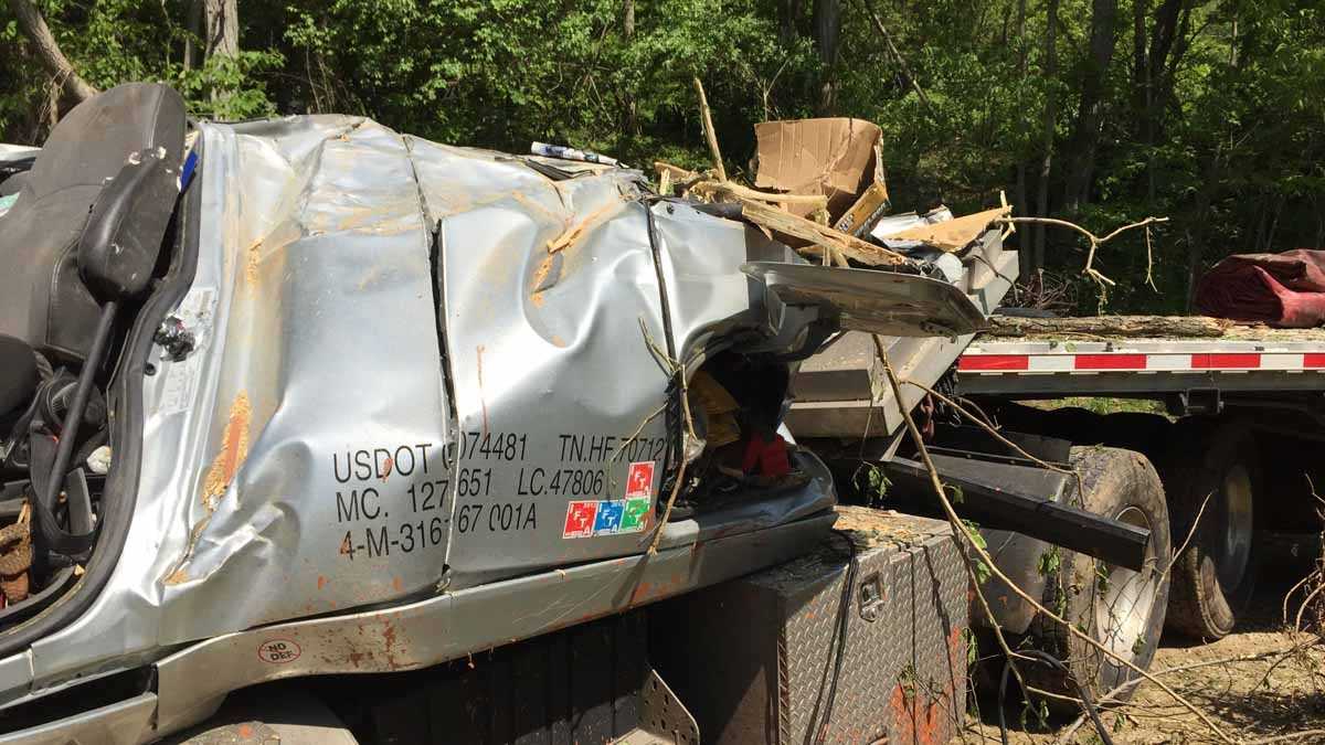 Photos: Driver killed when semi hits house