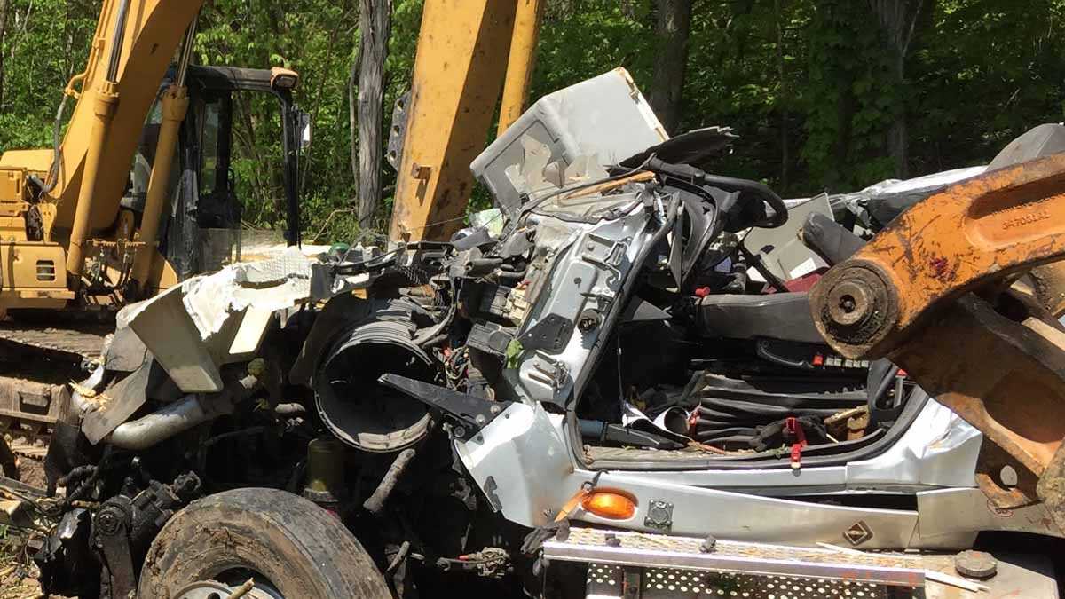 Photos: Driver killed when semi hits house