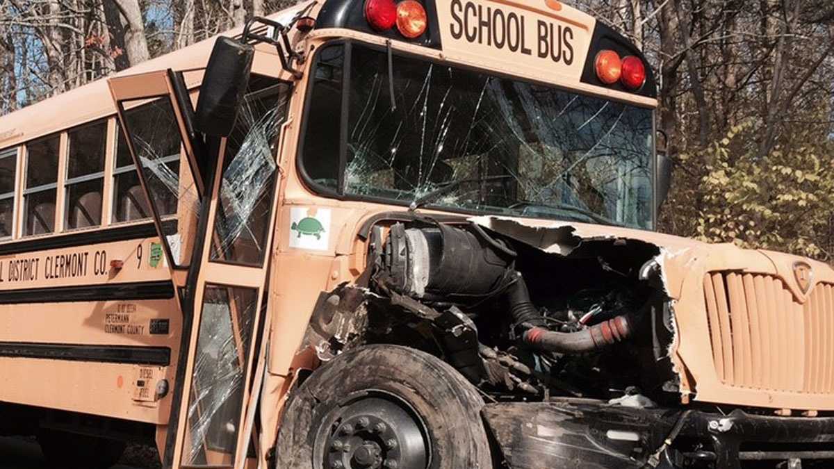 Photos: Students escape injury when bus hits tree