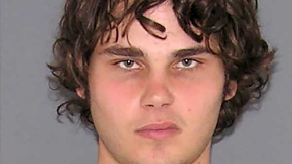 Man accused of kicking, spitting on officer