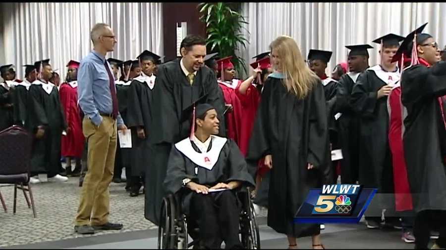 Lionel Hill, teen battling cancer, graduates from Hughes High School