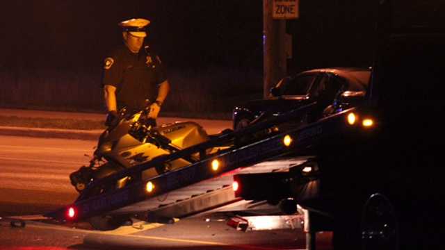 Woman charged in crash that killed motorcycle rider