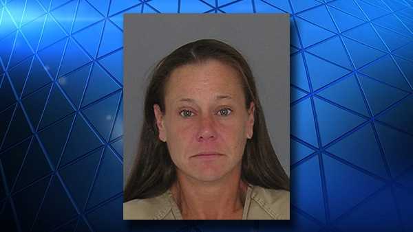 Police: Woman found passed out with child in car