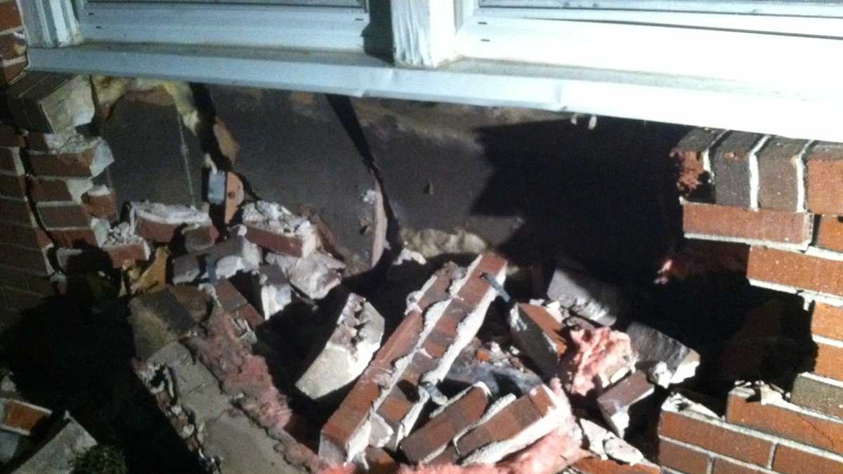 Student driver drives into building