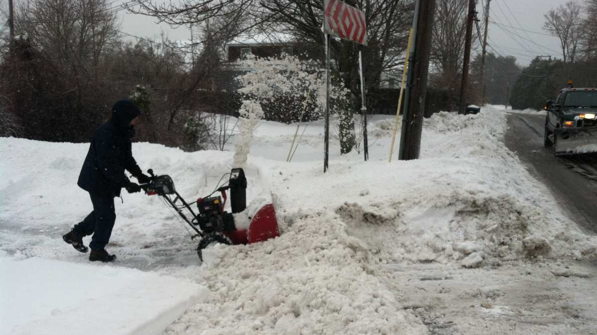 Photos: Latest storm brings heavy, wet snow