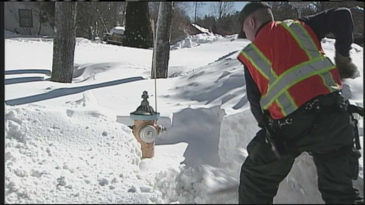 Firefighters scramble to dig out hydrants