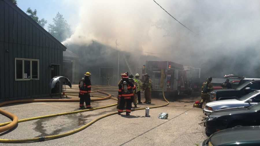 Crews battle fire at Saco auto body shop