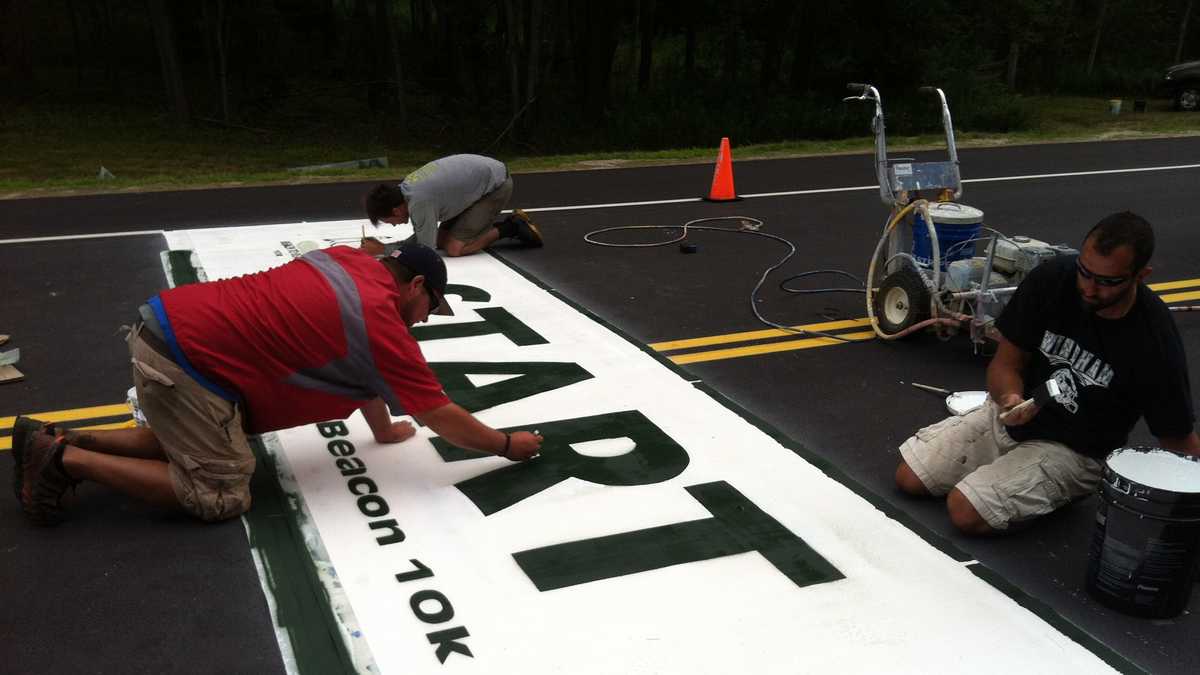 Photos: Painting the starting line for the Beach to Beacon 10 k