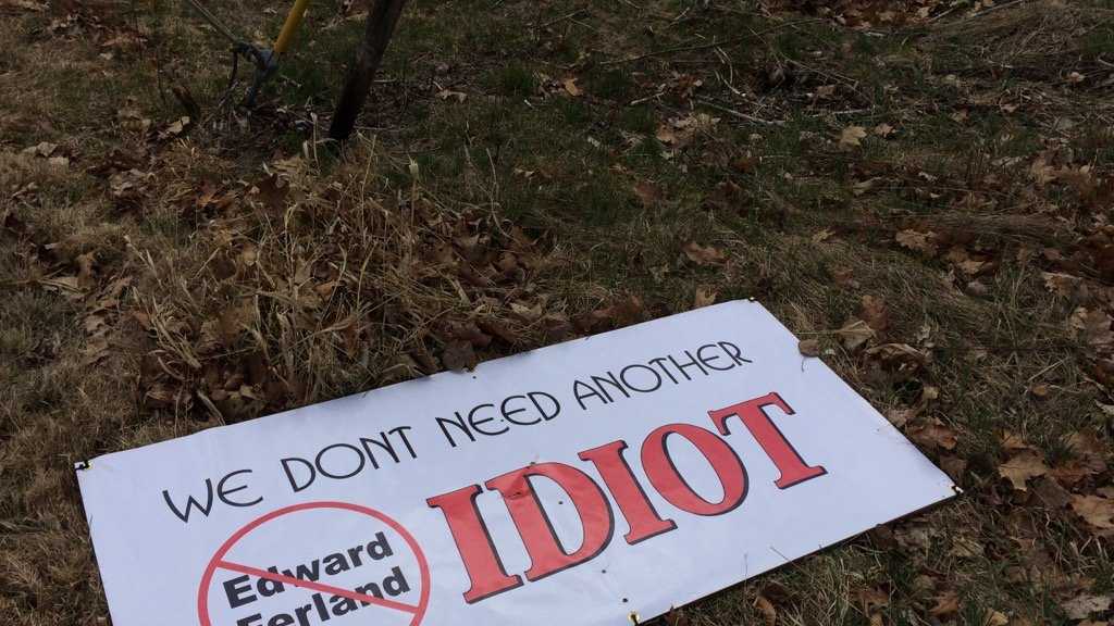 Residents call 'We don't need another idiot' sign dirty politics