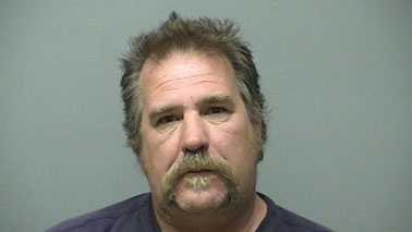 Police: Manchester man threatens couple with gun