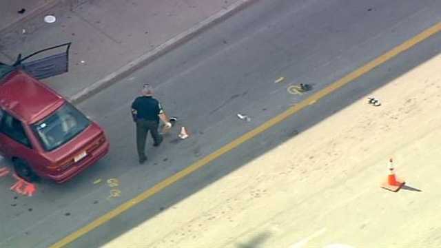 Images: Car jumps curb, hits pedestrians