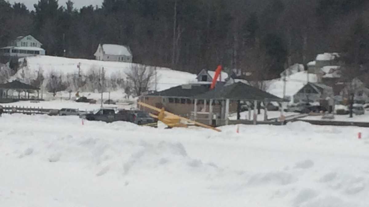 Photos: Plane crash-lands on Alton Bay