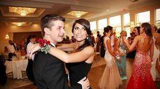 Mass. teen takes NESN personality Jenny Dell to prom
