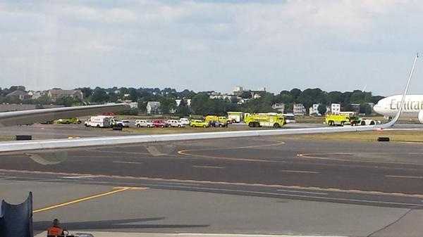 Boeing 777 engine briefly catches fire on Logan Runway