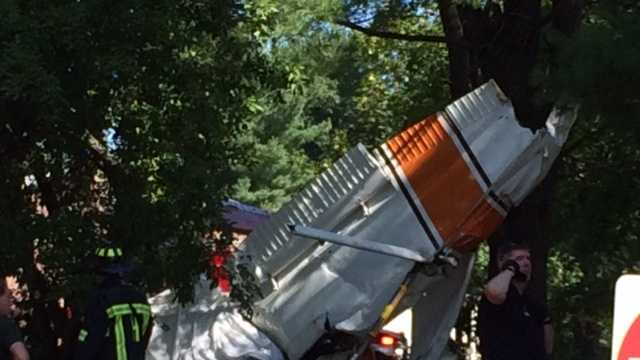Images: Plane crashes into trees after takeoff