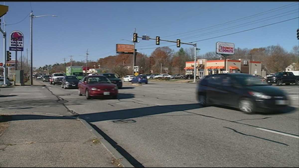 Brothers charged after man says gun shown in road-rage incident