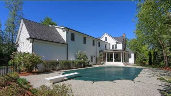 Mansion Monday: Hollis home with in-ground pool, media room, gym
