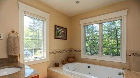 Mansion Monday: Hollis home with in-ground pool, media room, gym