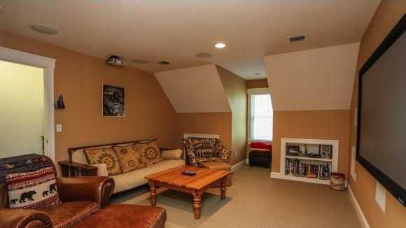 Mansion Monday: Hollis home with in-ground pool, media room, gym