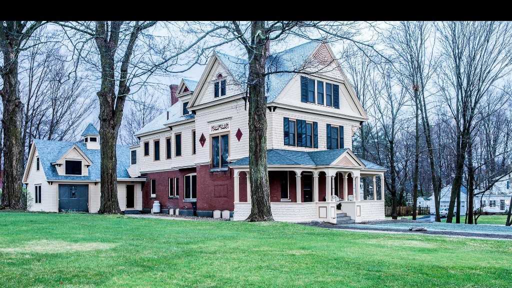 Mansion Monday: Home built in 1889 has spiral staircase, carriage house