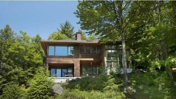 Mansion Monday: Private retreat has mountain views, pondside cabin ...