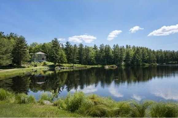 Mansion Monday: Private retreat has mountain views, pondside cabin ...