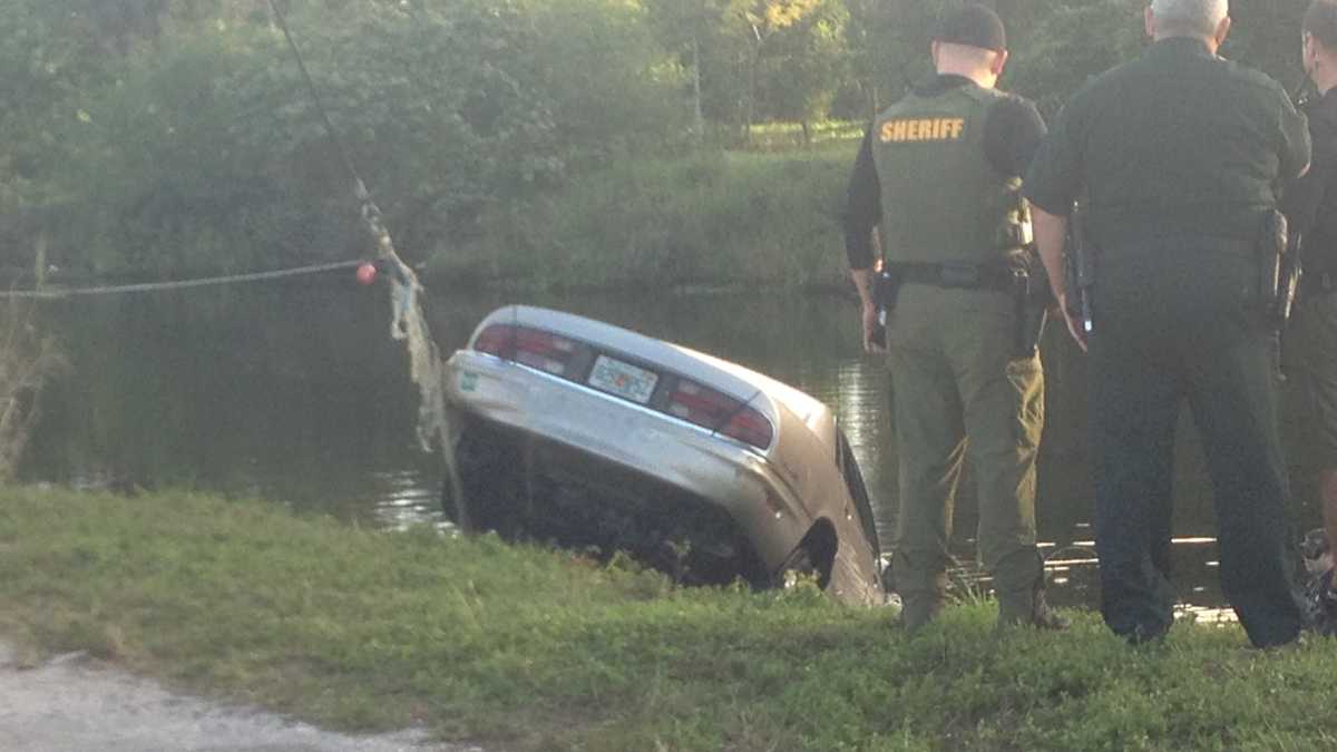 Images: Car pulled from canal after traffic stop leads to chase