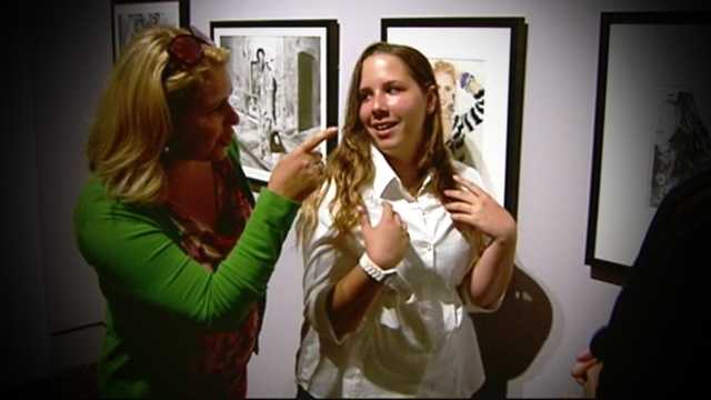 Years after cochlear implant, deaf girl now thriving as teen artist