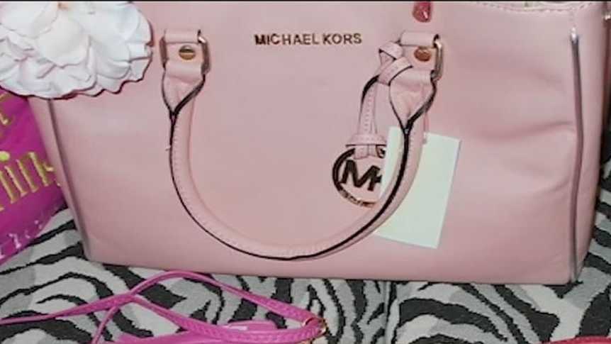 Woman charged with selling designer knockoffs