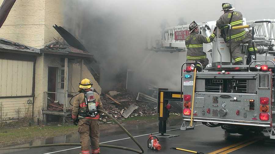 PHOTOS: Fire levels apartment building