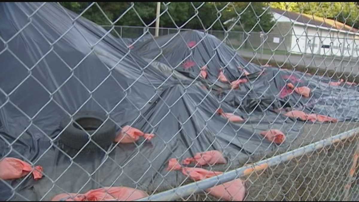 City talks contaminated soil pile with residents